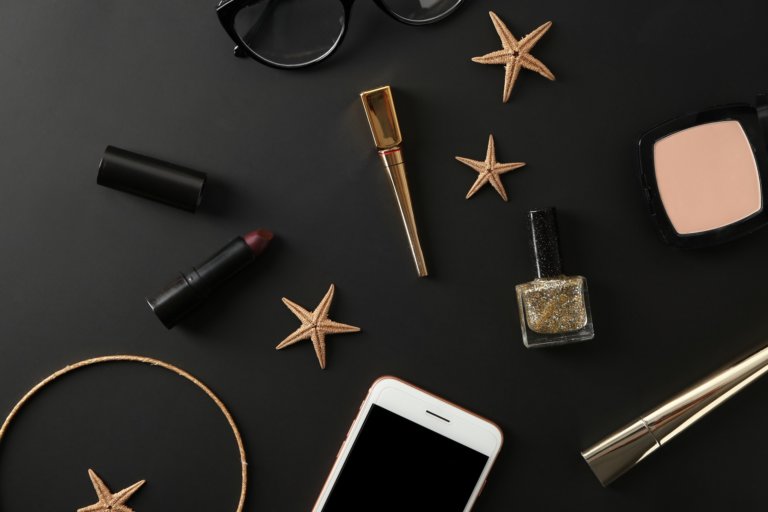 Beauty PR | Flat lay composition with mobile phone, cosmetics and ...